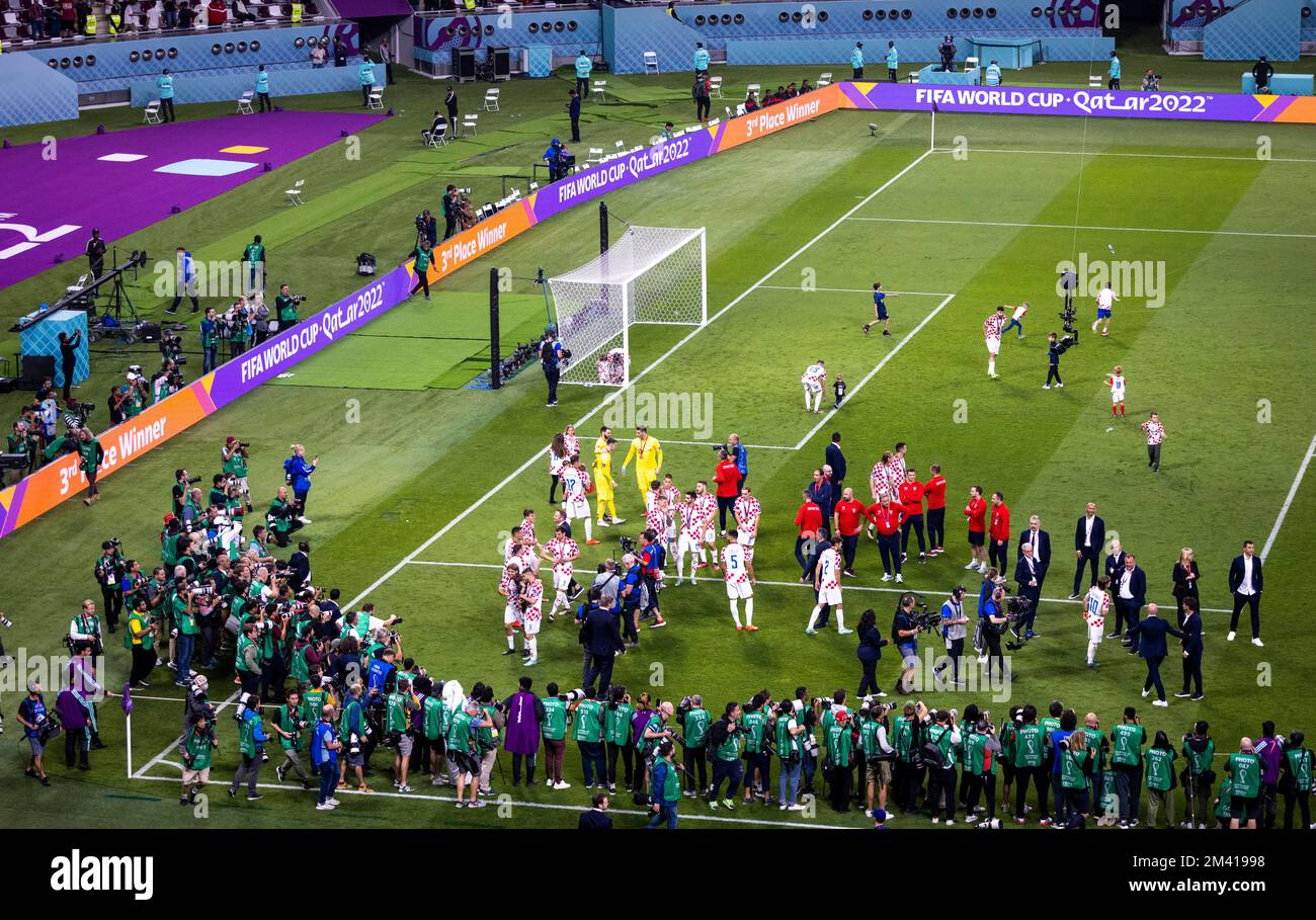 Doha, Qatar. 17th Dec, 2022. Photographers surround the Croatian team ...