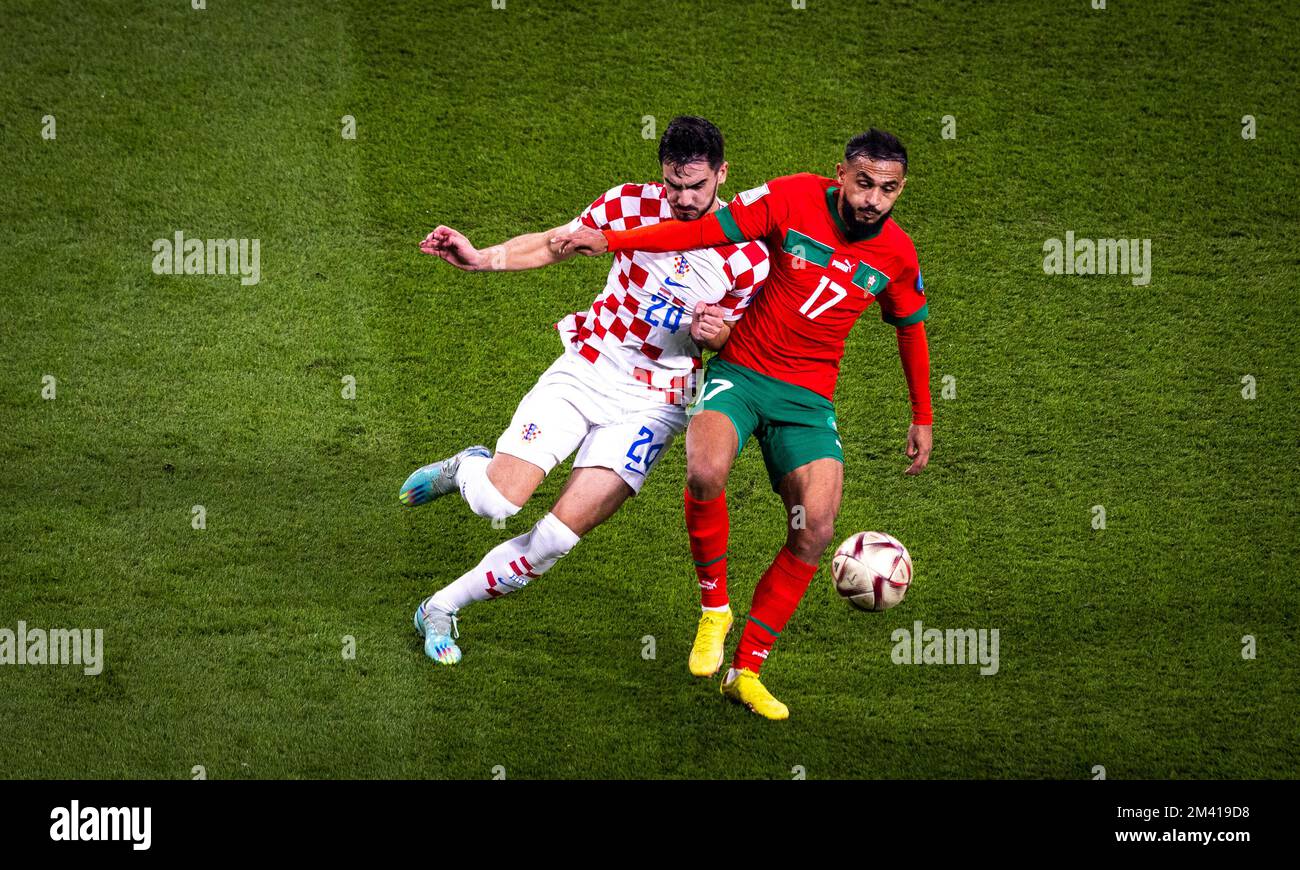 Doha, Qatar. 17th Dec, 2022. Josip Sutalo (Kroatien), Sofiane Boufal ...