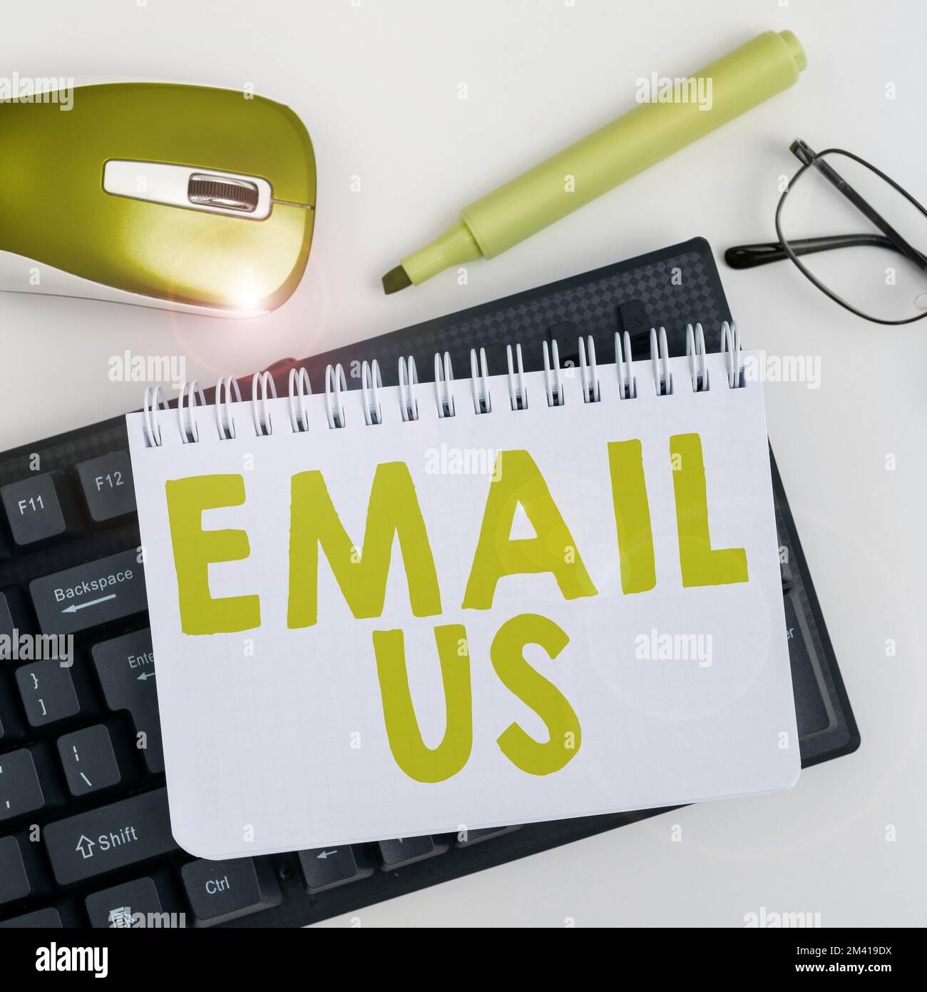 Handwriting text Email Us. Word for Sending a commercial message to a ...