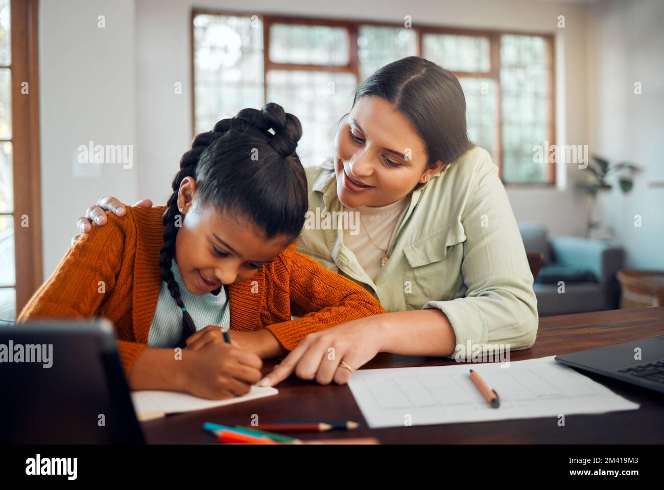 Learning, teaching and mother with child for writing, language and ...
