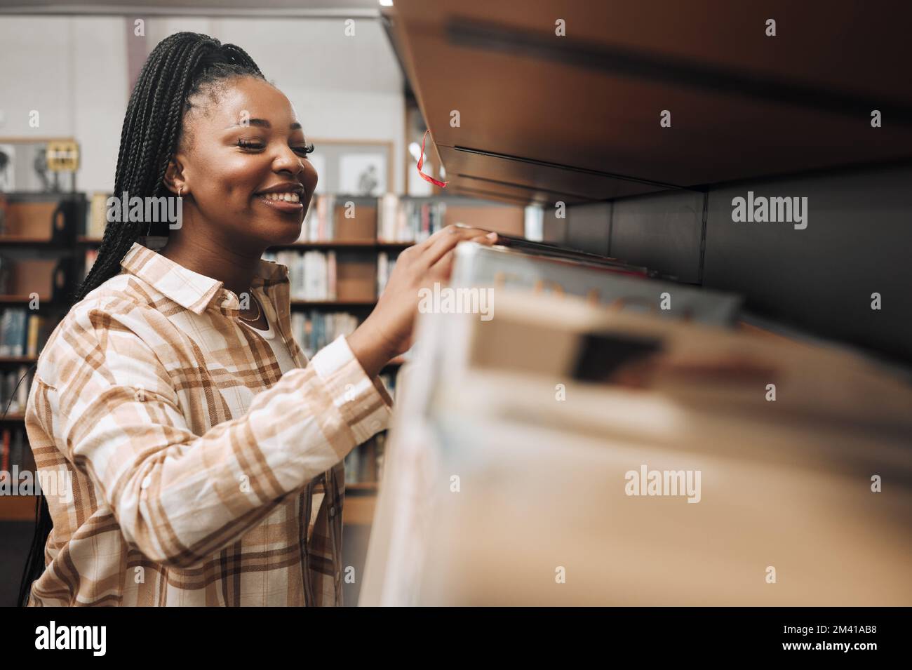 Library university checking hi-res stock photography and images - Alamy