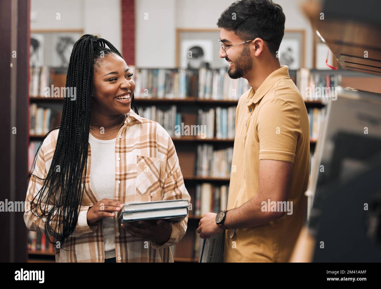 Books, library and couple of friends with study communication, research ...