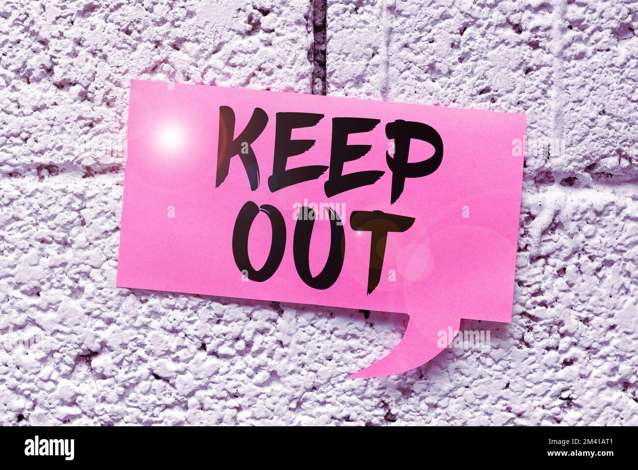 Hand writing sign Keep Out. Concept meaning to stop someone or ...