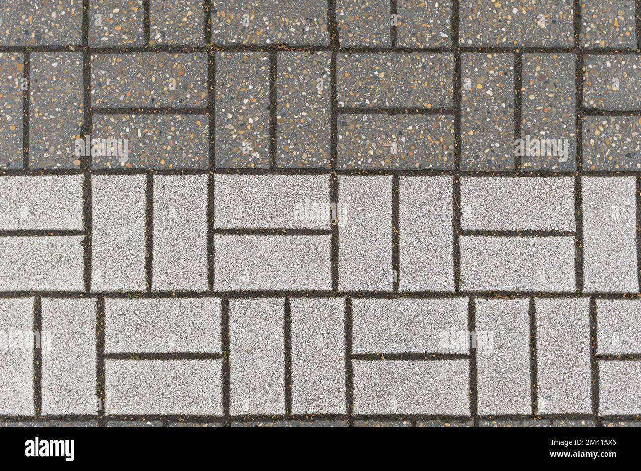 The texture of paving slabs lined with graphic ornament. White and gray ...