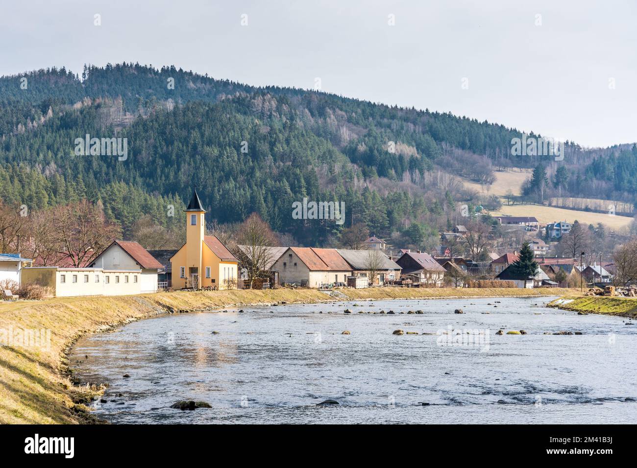 View of small village near the river, with typical architecture and ...