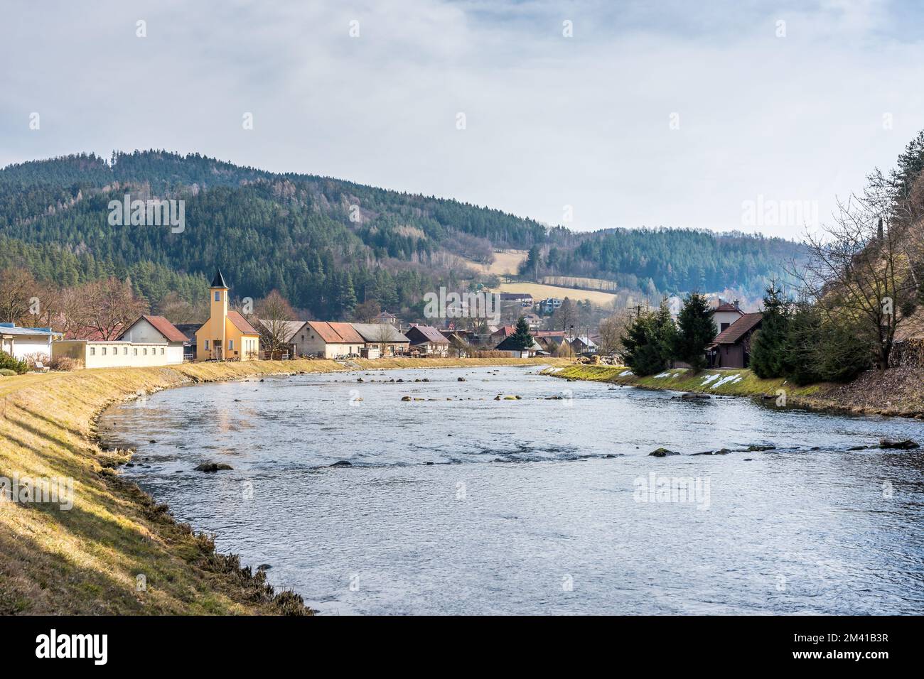 View of small village near the river, with typical architecture and ...