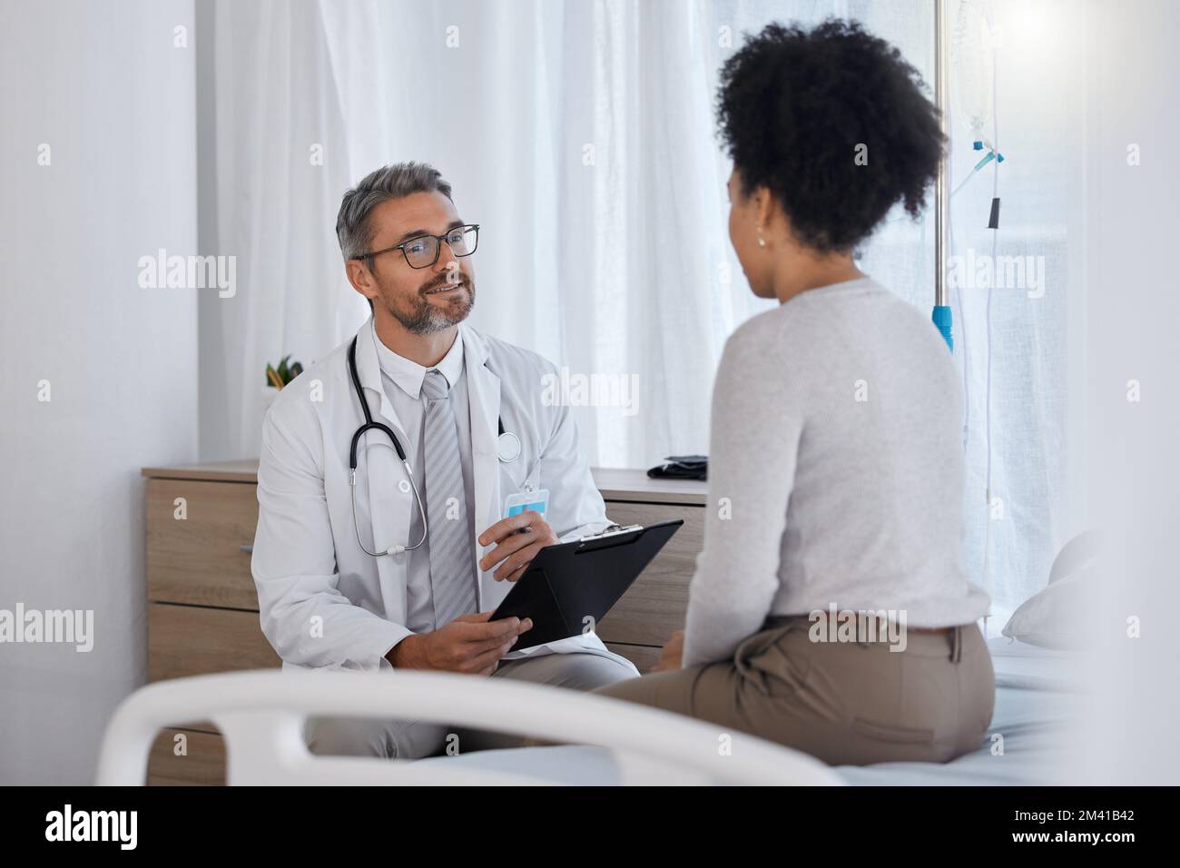 Doctor, patient and hospital consultation while talking about ...