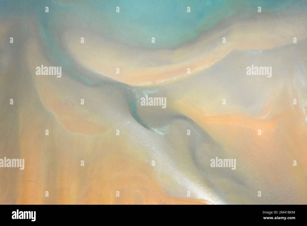 An aerial top view of the waters of the Atlantic ocean mixing with the ...