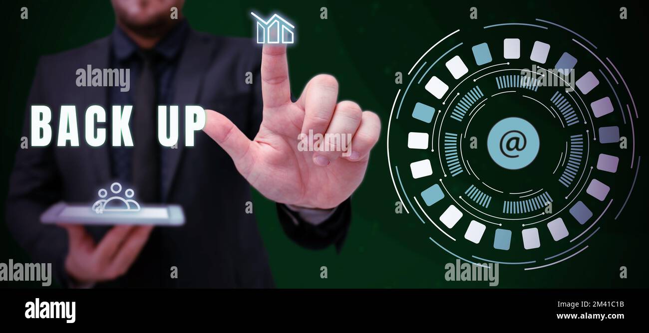 Sign displaying Back Up. Business idea saving important data into ...