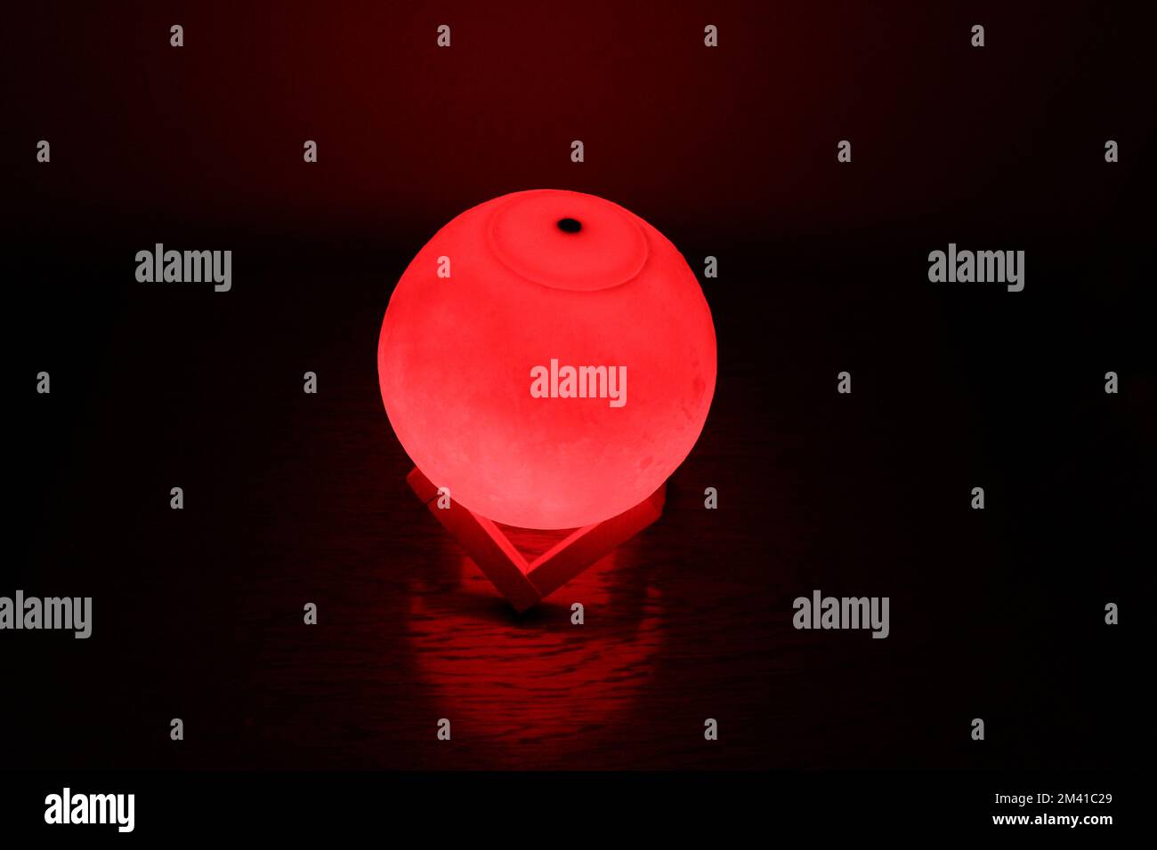 Complex moon lamp that has different colors concepts.This lamp also has ...