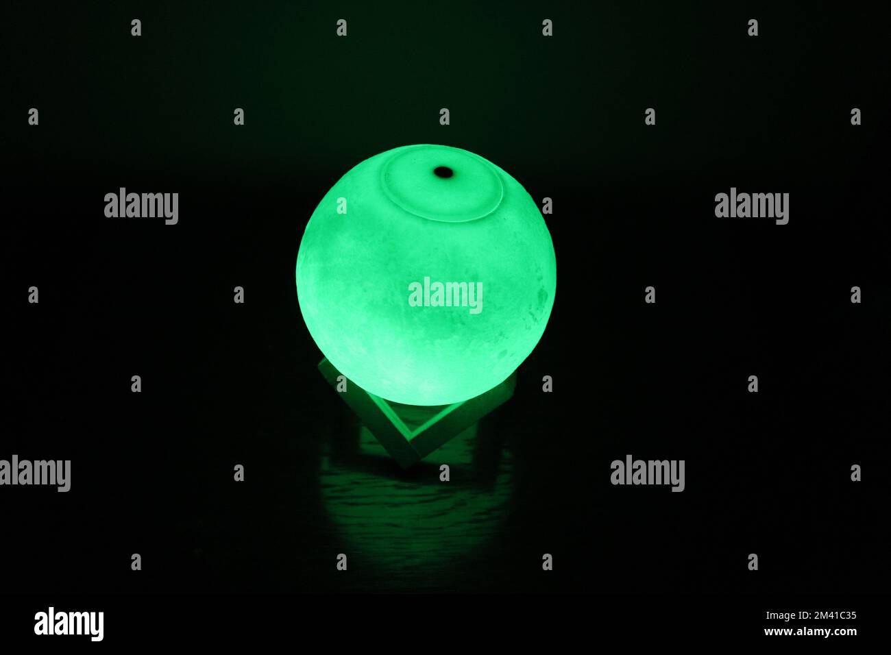 Complex moon lamp that has different colors concepts.This lamp also has ...