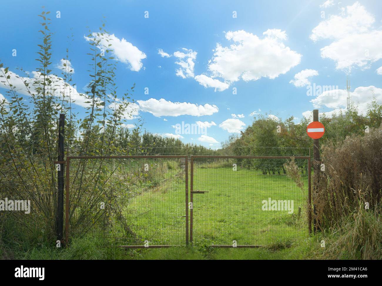 Closed entrance to a private land plot in the countryside Stock Photo ...