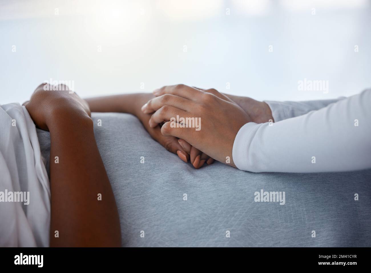 Empathy, support and hands of black family in hospital bed for sickness ...