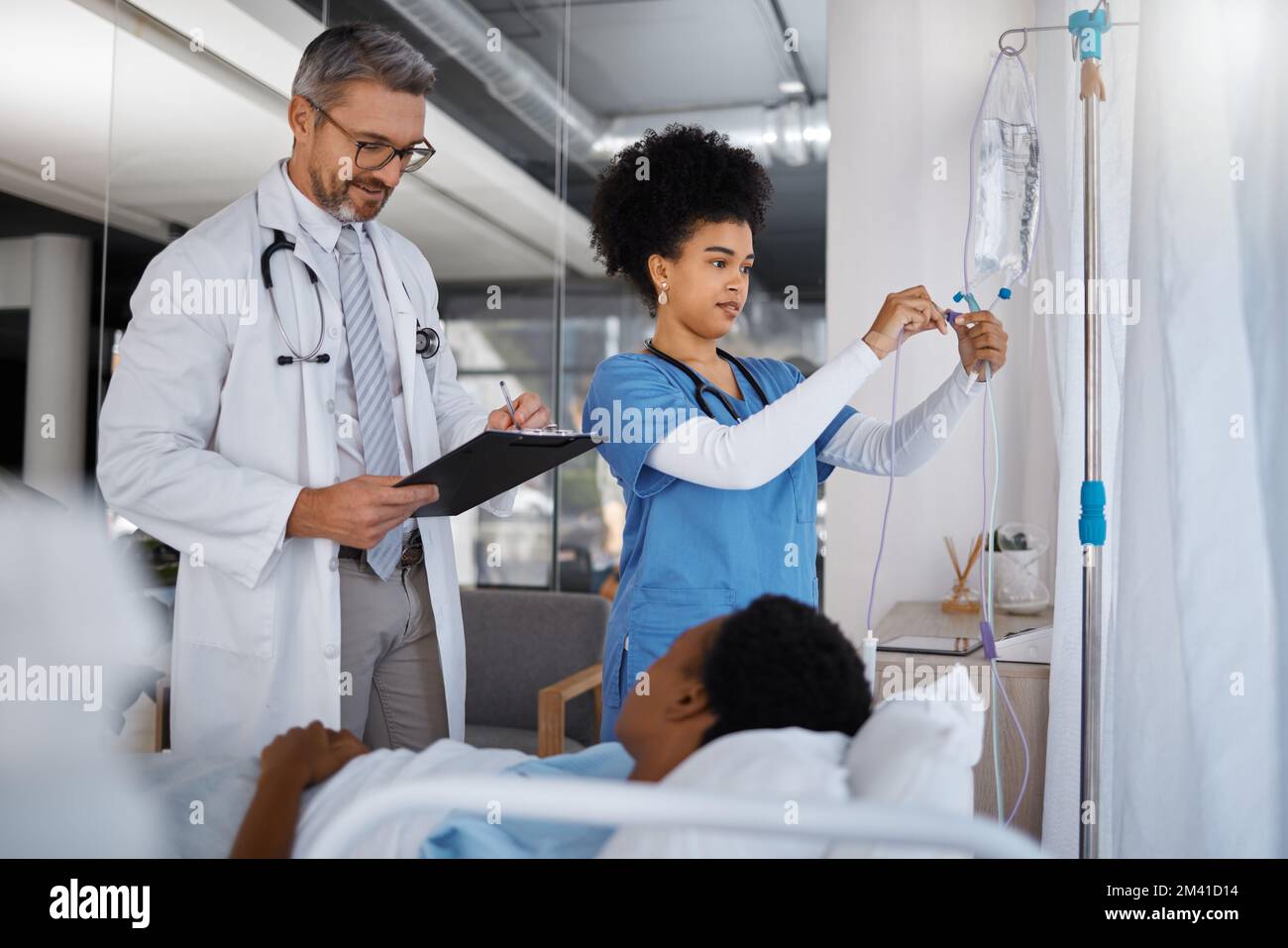 Doctor, nurse and patient in hospital, bed and clinic to check ...