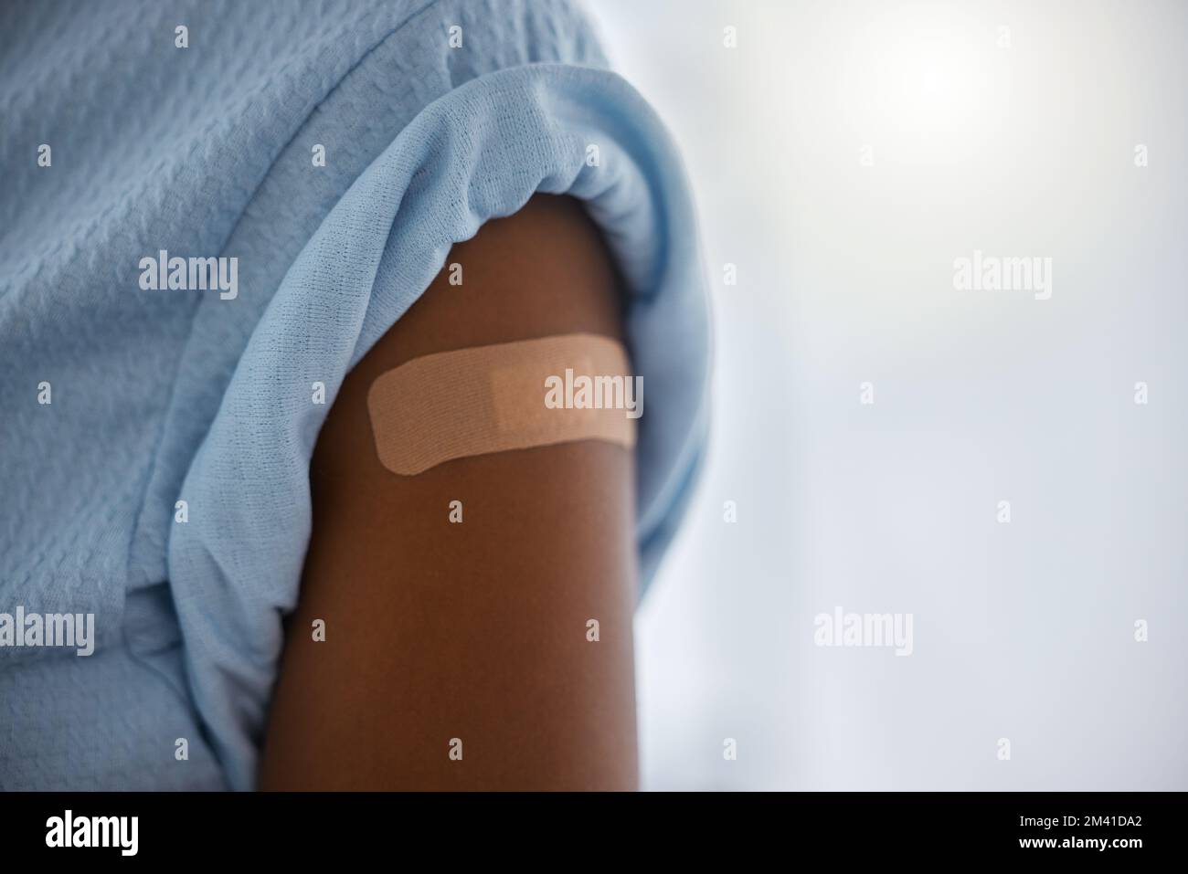 Covid booster shot arm hi-res stock photography and images - Alamy