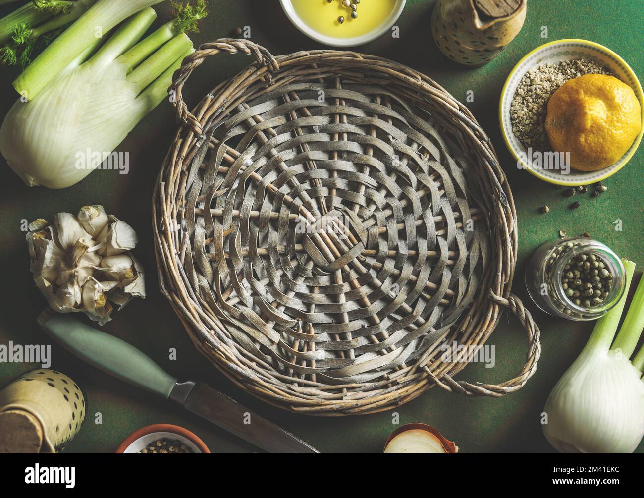 Healthy food background with empty wicker circle tray and cooking ...
