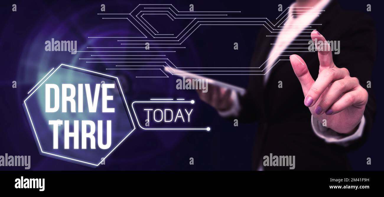 Sign displaying Drive Thru. Concept meaning place where you can get ...