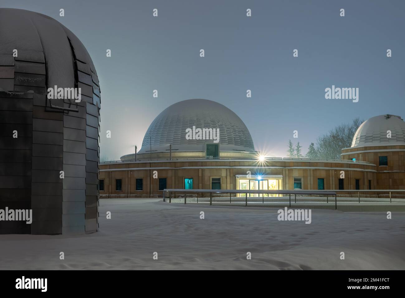 Silesian Planetarium during the blue hour. Beautiful winter scenery ...