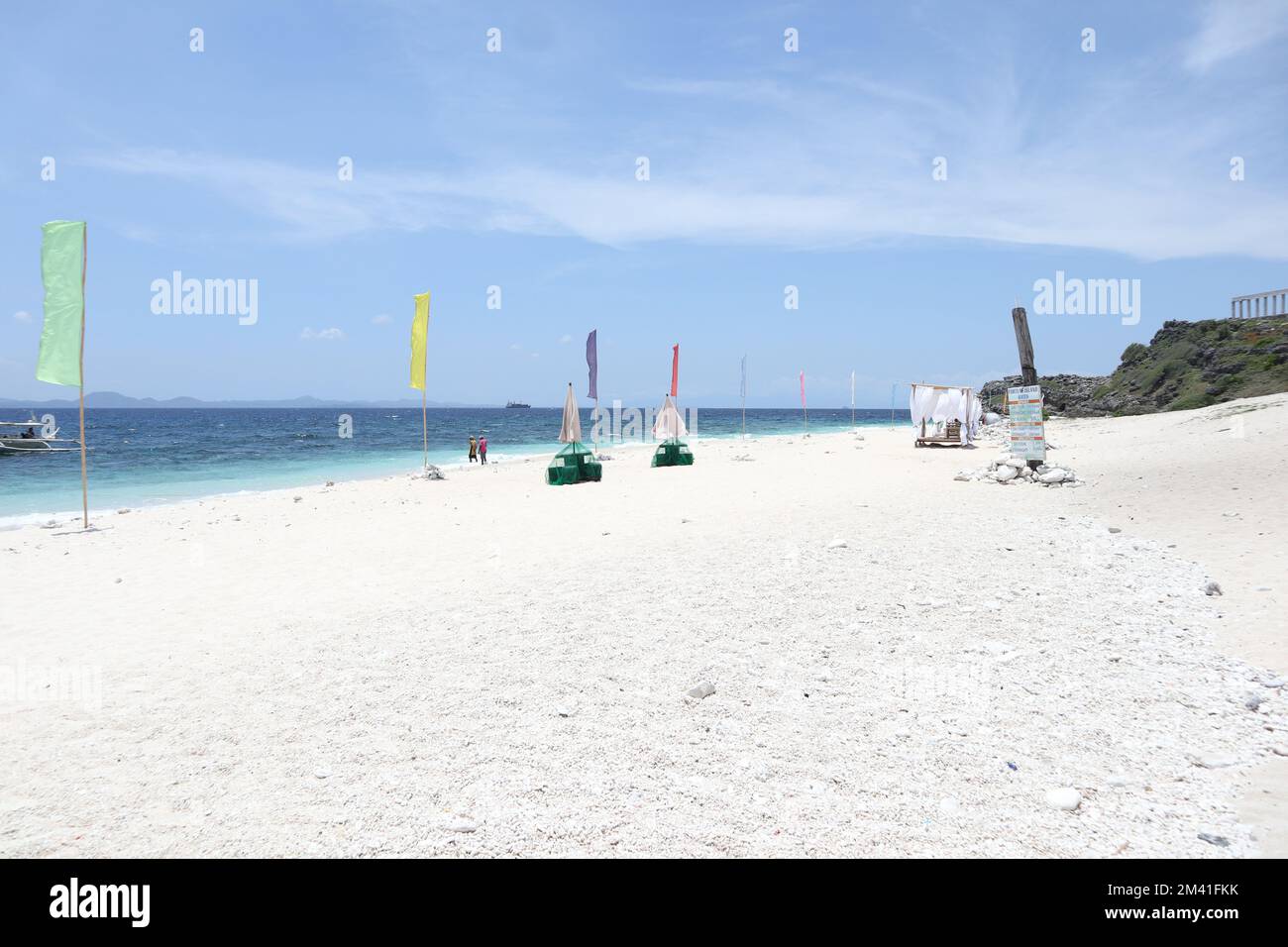A natural view of the long white beach in Fortune Island, Nasugbu ...