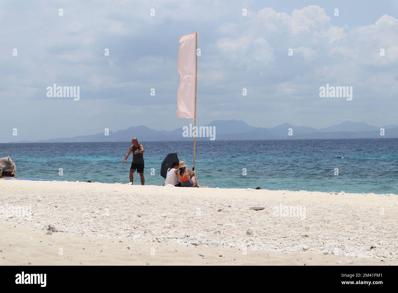 A natural view of the long white beach in Fortune Island, Nasugbu ...