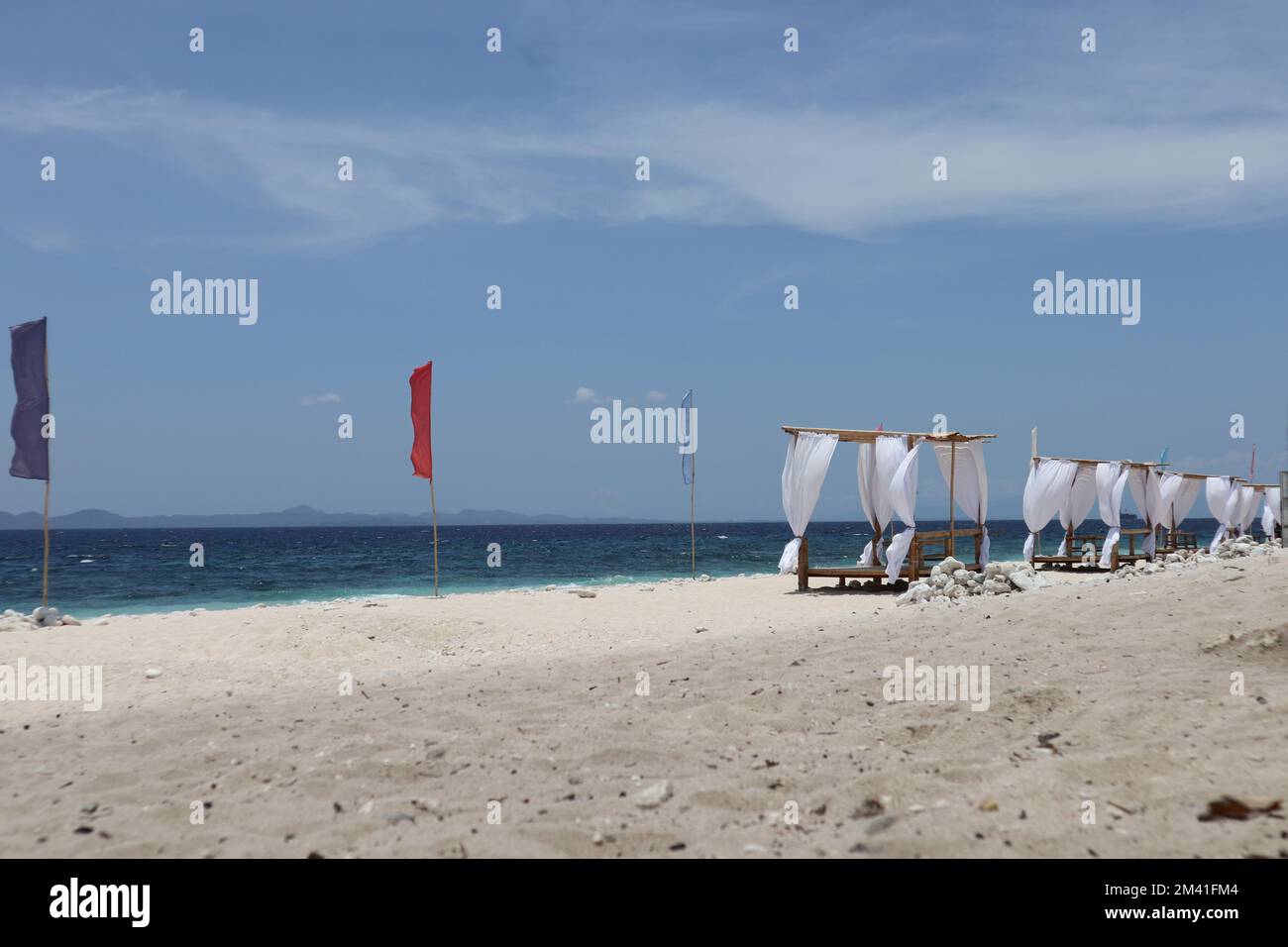 A natural view of the long white beach in Fortune Island, Nasugbu ...