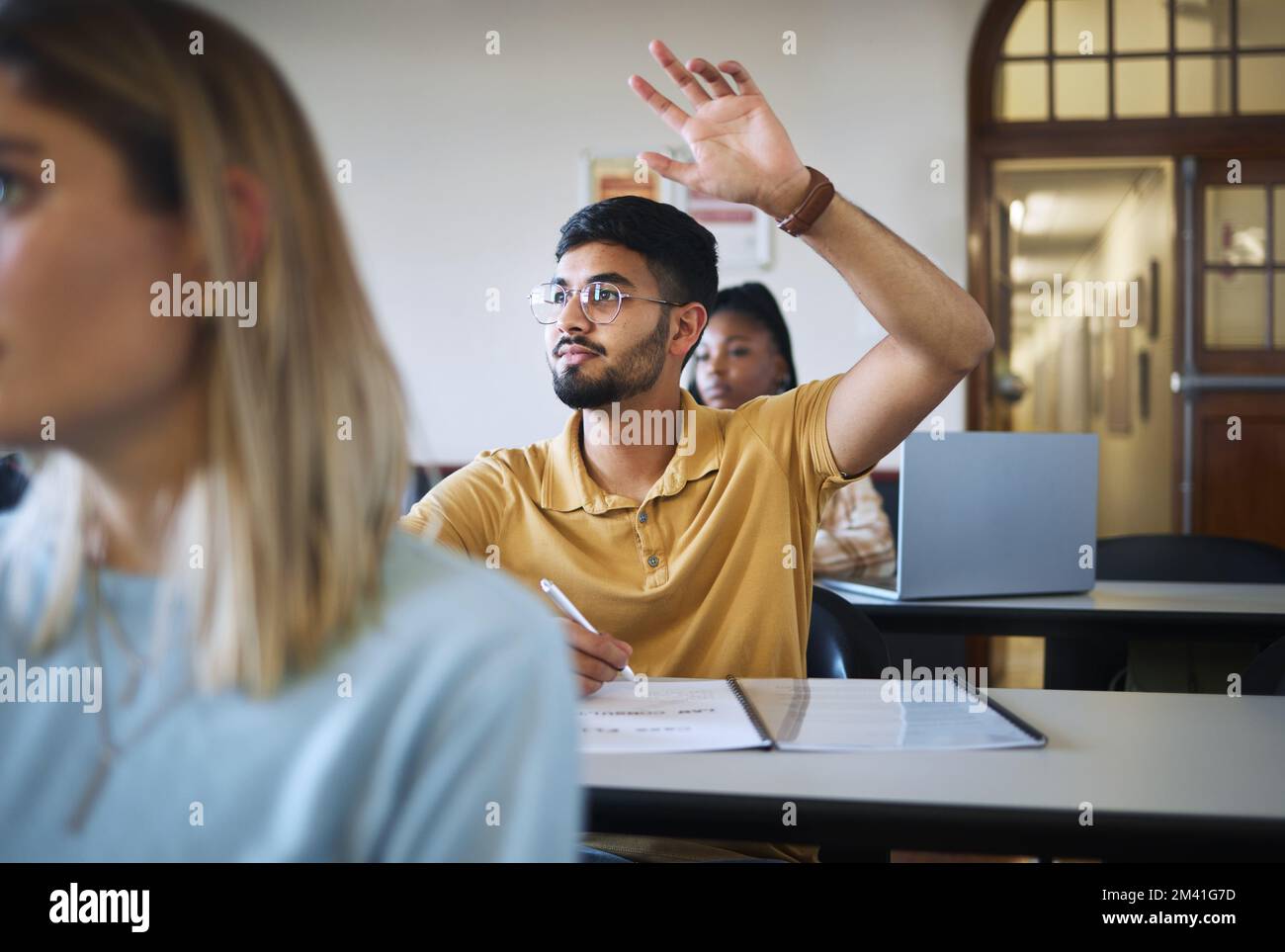 University student, hands and answer question in classroom for teaching ...