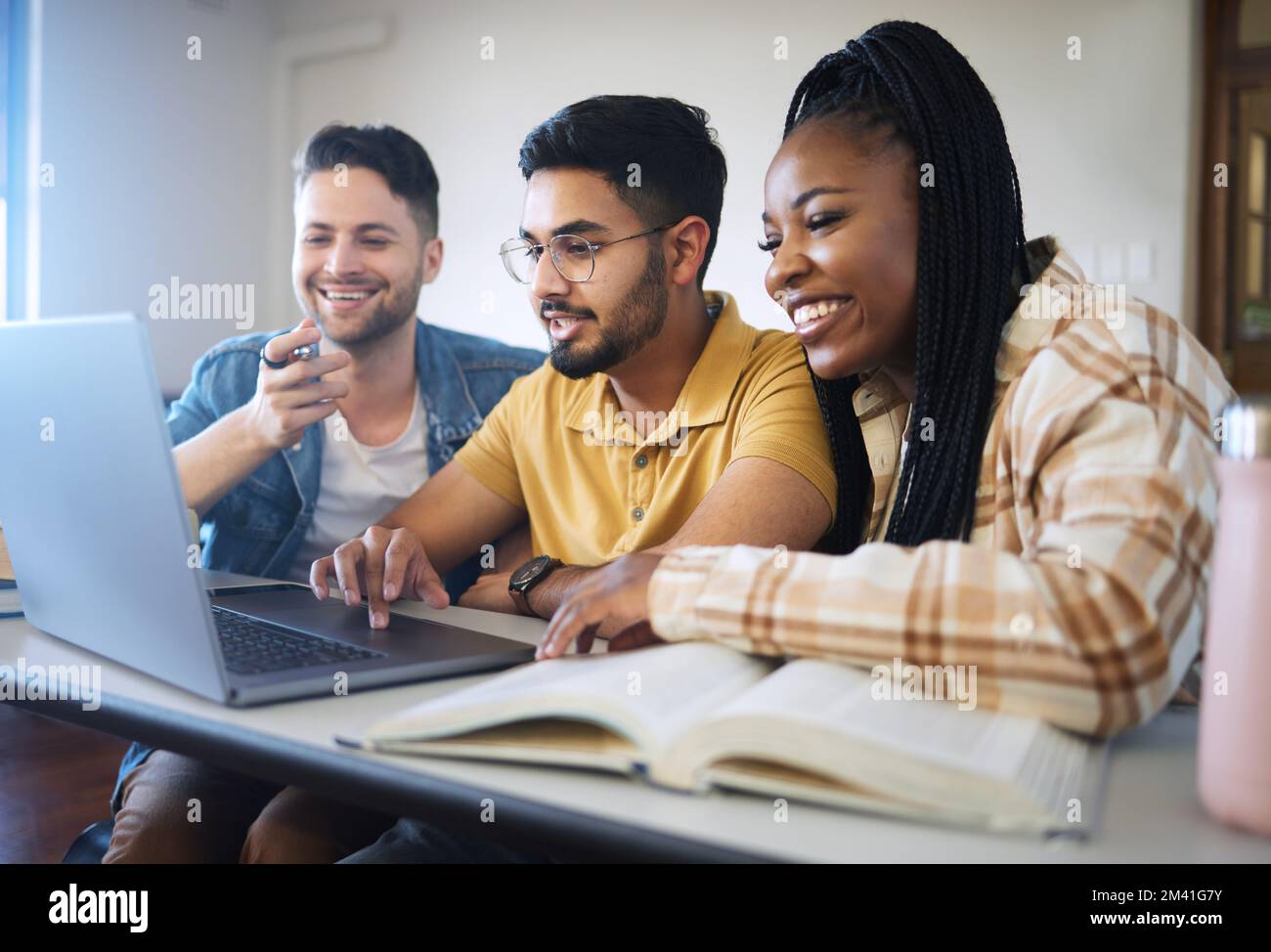 Study, classroom and diversity students on a laptop for elearning ...