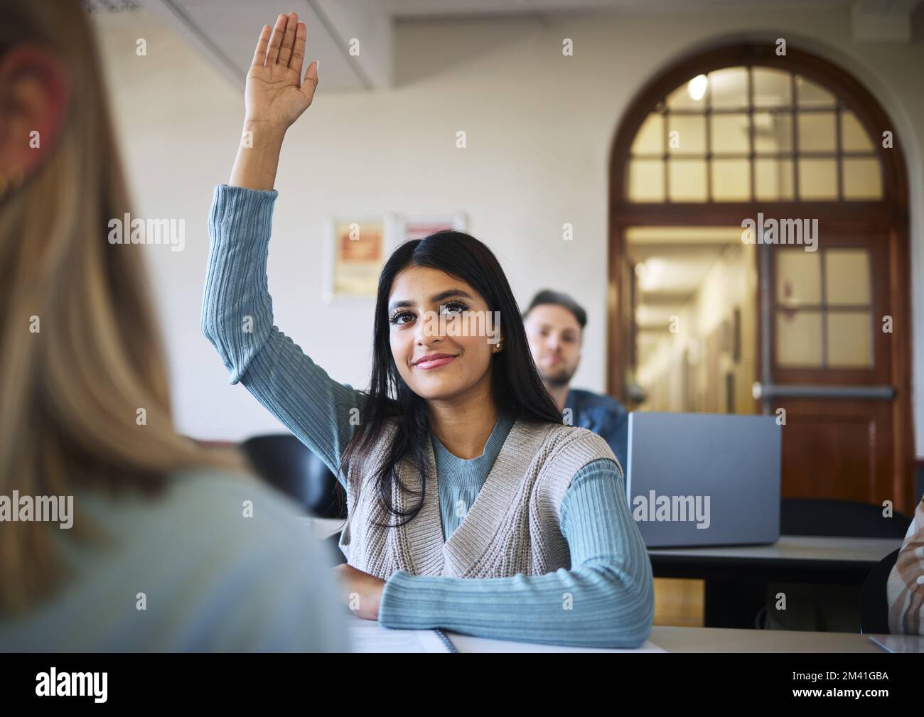 Classroom, woman and students hand for learning at university, ask ... Classroom, woman and students hand for learning at university, ask ...