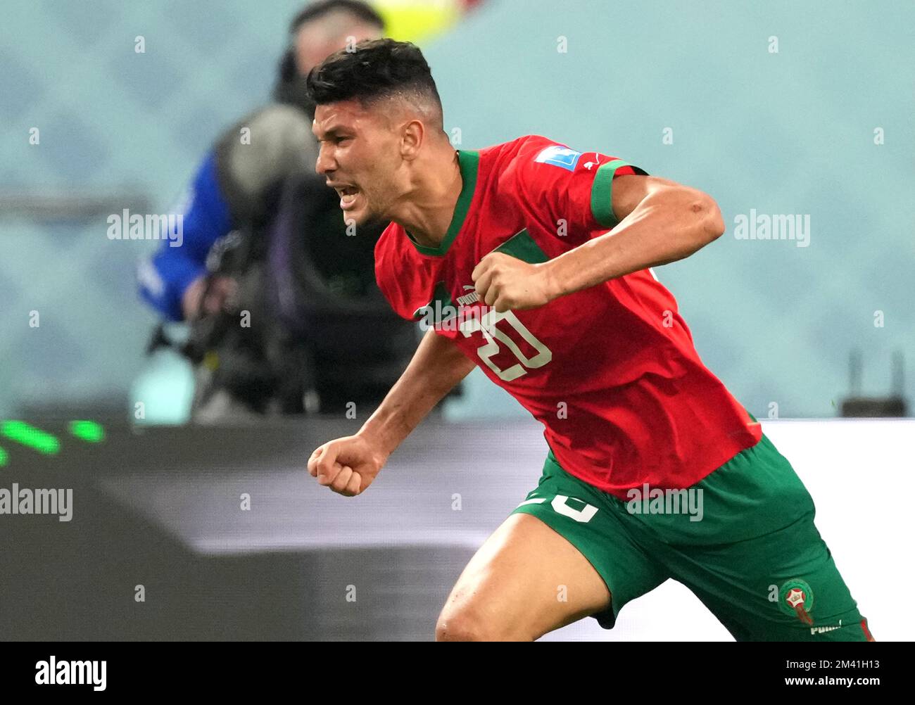 DOHA, QATAR - DECEMBER 17: Achraf Dari of Morocco celebrates with team ...