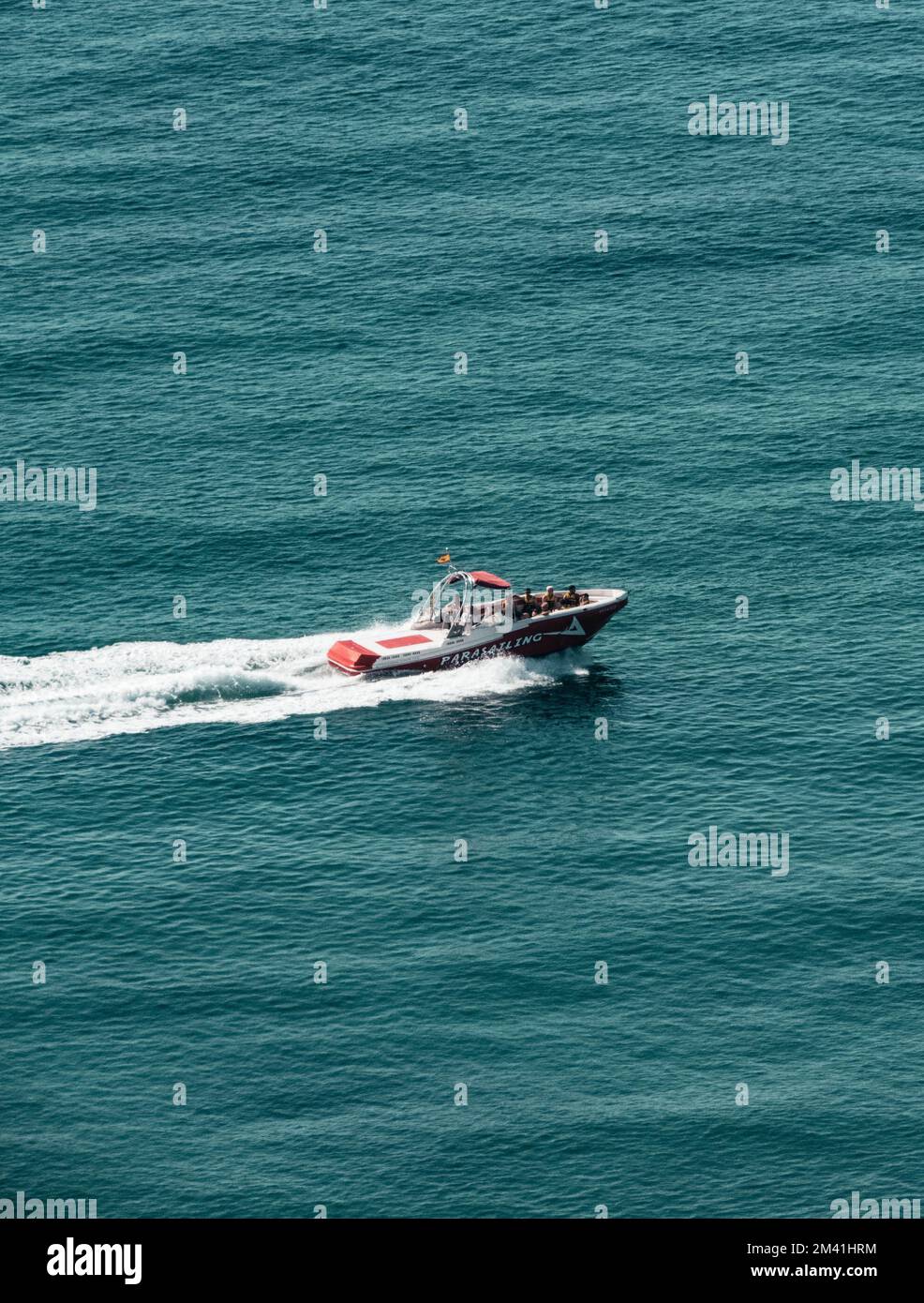 A boat leaving the trace on the sea Stock Photo - Alamy