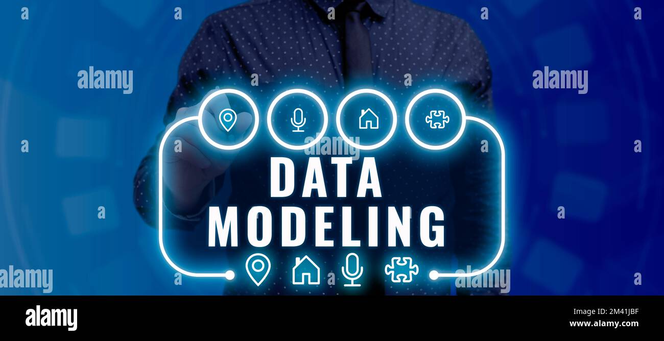 Hand writing sign Data Modeling. Business approach process of transferring data between data ...