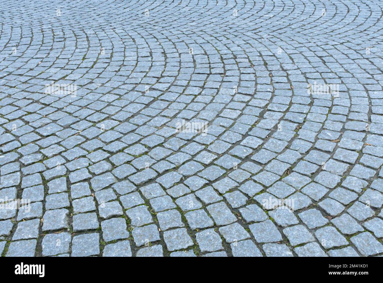 Patterned paving slabs in the form of a fountain Stock Photo - Alamy