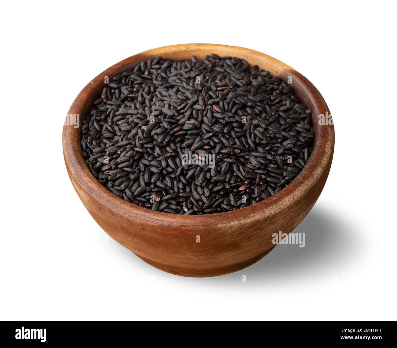 Raw black rice in a bowl isolated over white background Stock Photo - Alamy