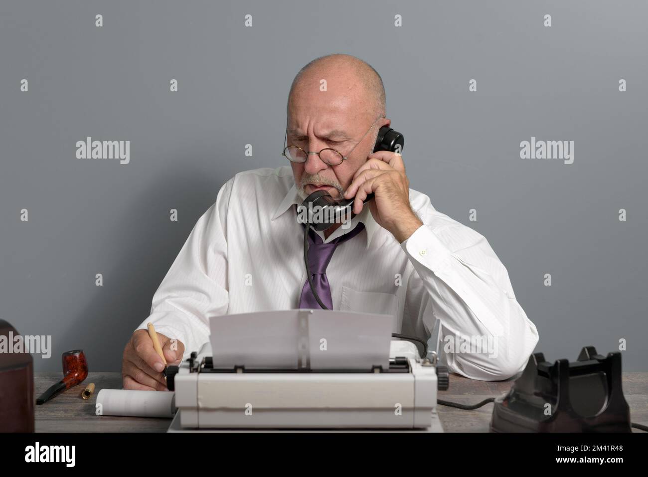 Vintage Journalist at work. Desk with telephone and typewriter. Writer ...
