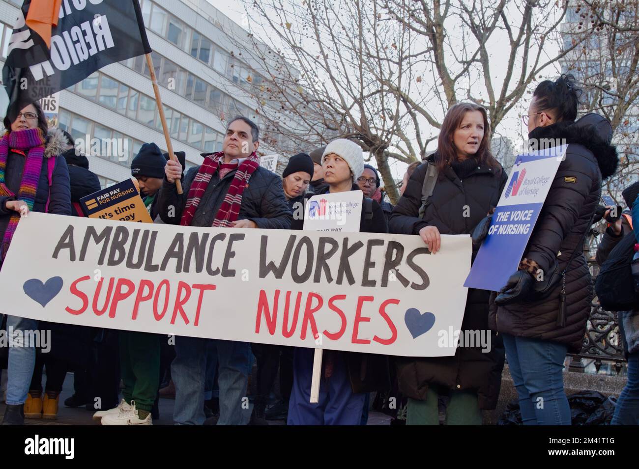 Group Of Ambulance Workers Holding A Banner In Support Of The Nurses ...