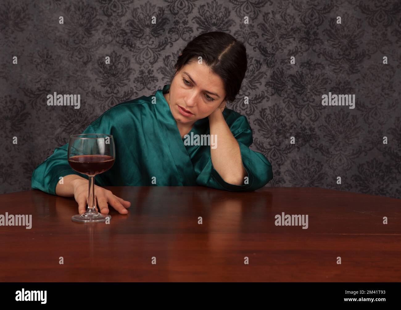 Young woman struggling with alcohol abuse Stock Photo - Alamy
