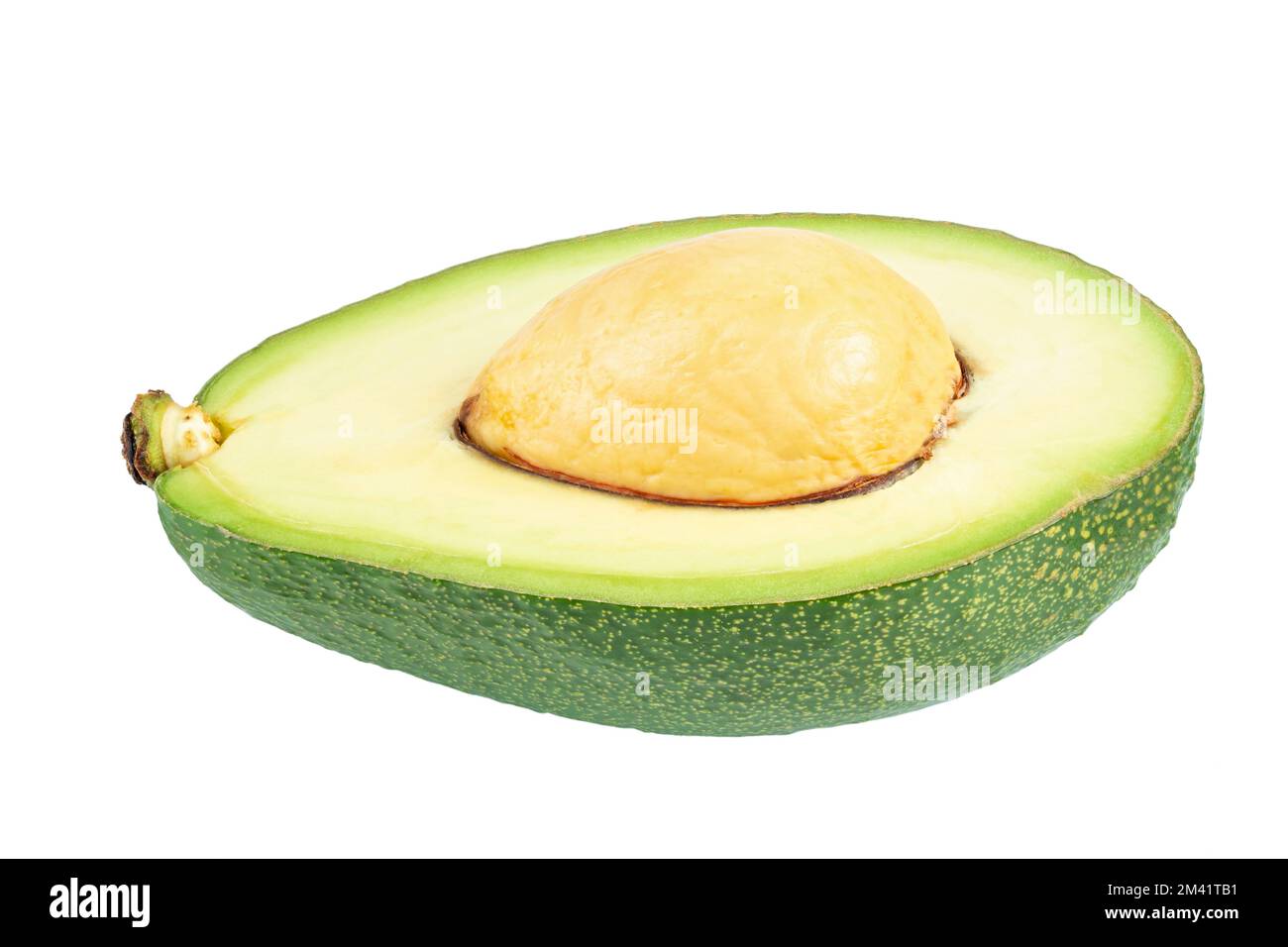 Avocado cut in half with bone isolated on white. Fresh vegetables. File ...