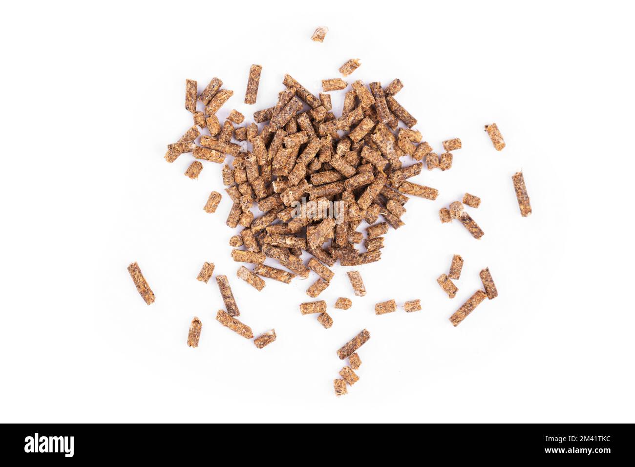 Sunflower granulated feed on white background, close-up. Pile of ...