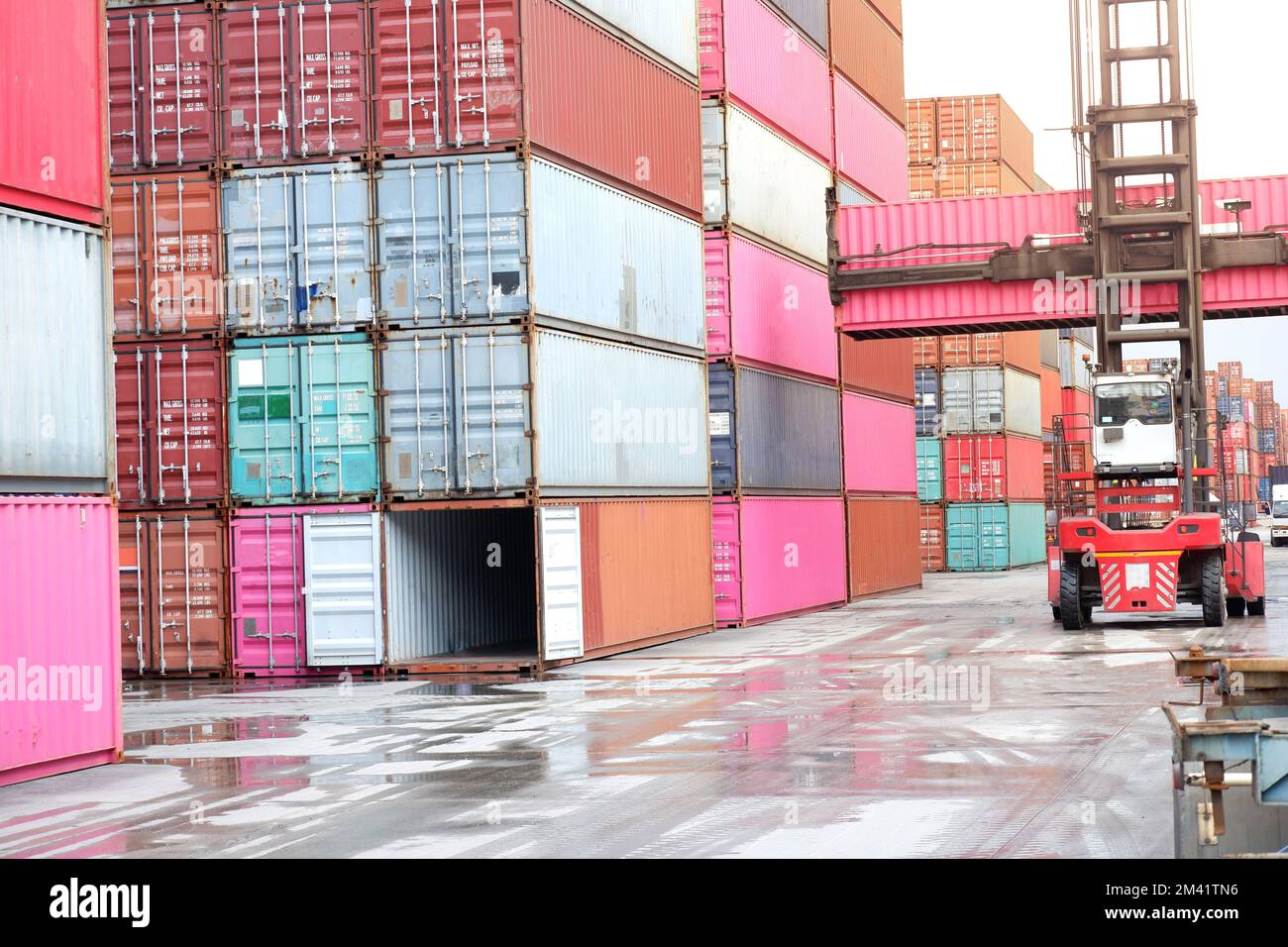 forklift truck Container boxes in a logistics yard with a stack of ...