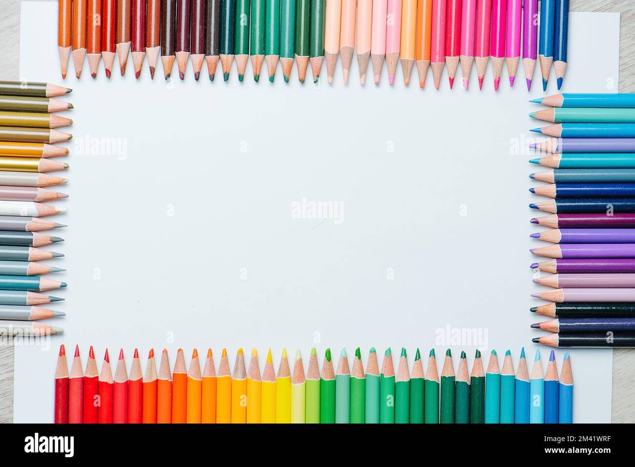 Horizontal rectangular mockup composition of tightly placed crayons ...