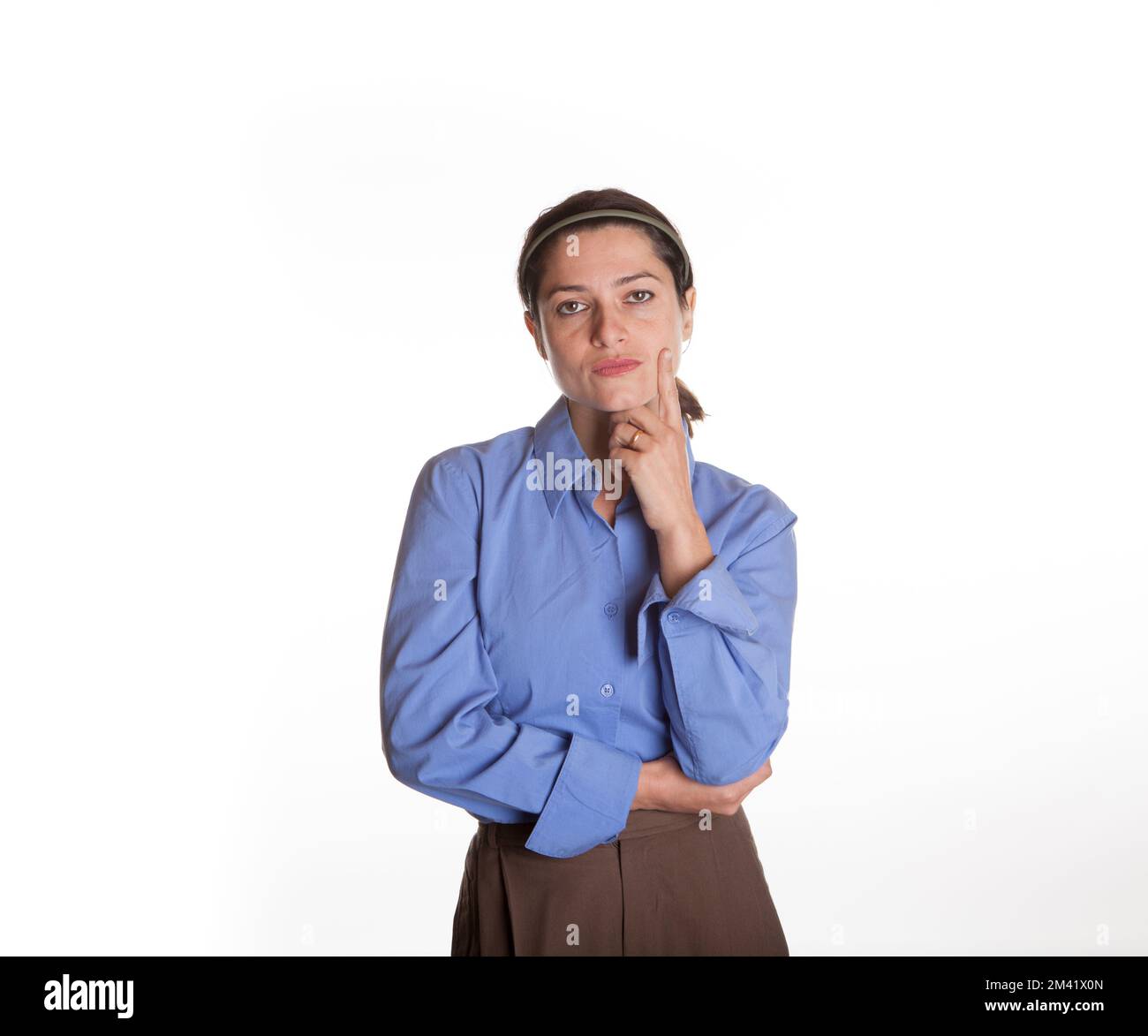 Finger on cheek hi-res stock photography and images - Alamy