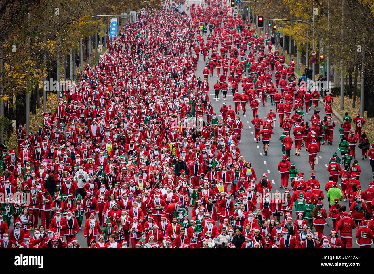 Madrid, Spain. 18th Dec, 2022. Thousands of people dressed as Santa ...
