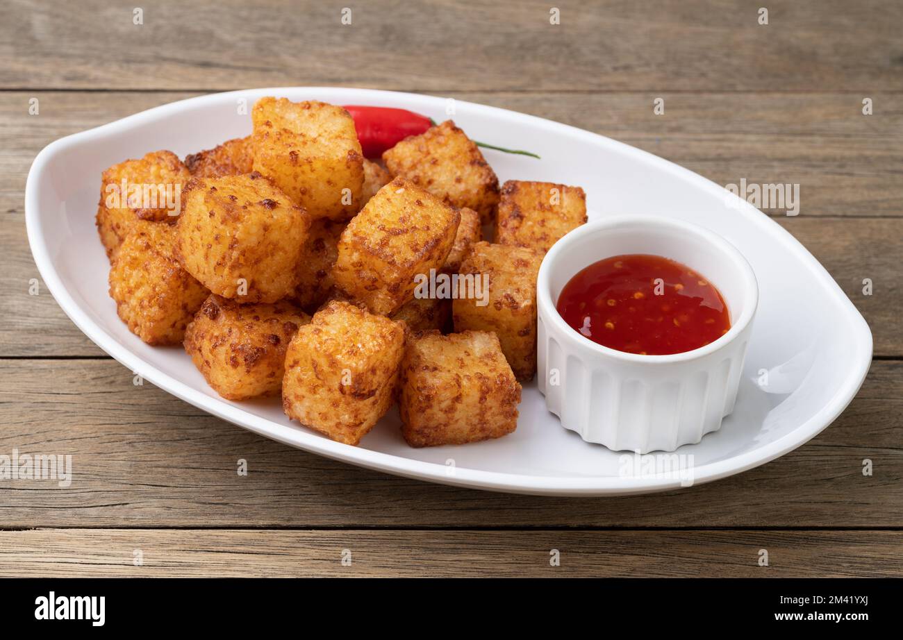 Tapioca dice, typical northeast brazilian food with chilli pepper syrup ...