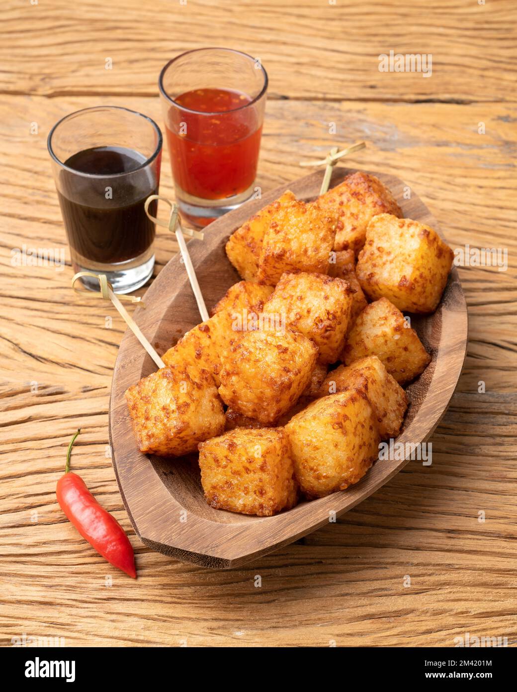 Tapioca dice, typical northeast brazilian food with chilli pepper and ...