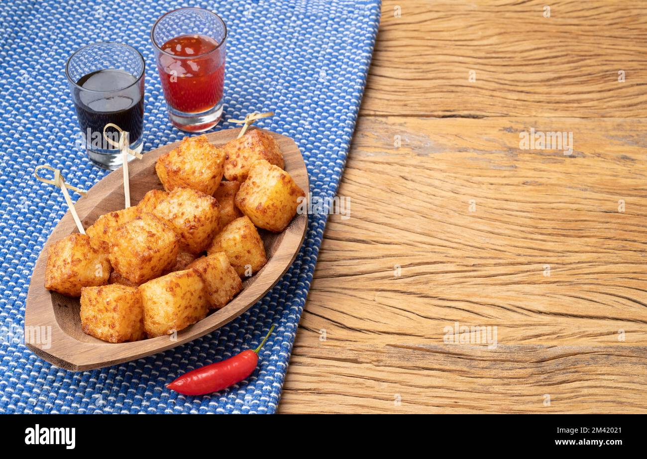 Tapioca dice, typical northeast brazilian food with chilli pepper and ...