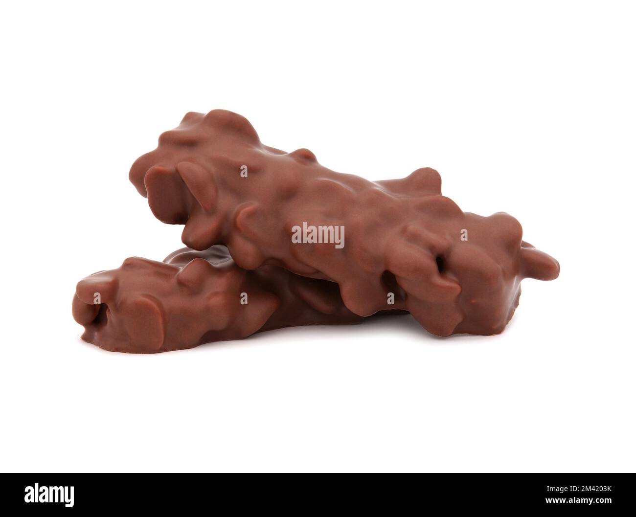 Peanuts caramel bars covered with milk chocolate, isolated on white ...