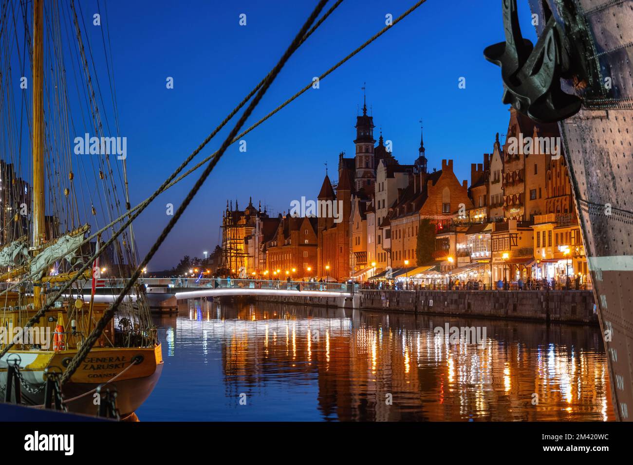 Gdansk city by night on the Baltic coast in northern Poland. River view ...