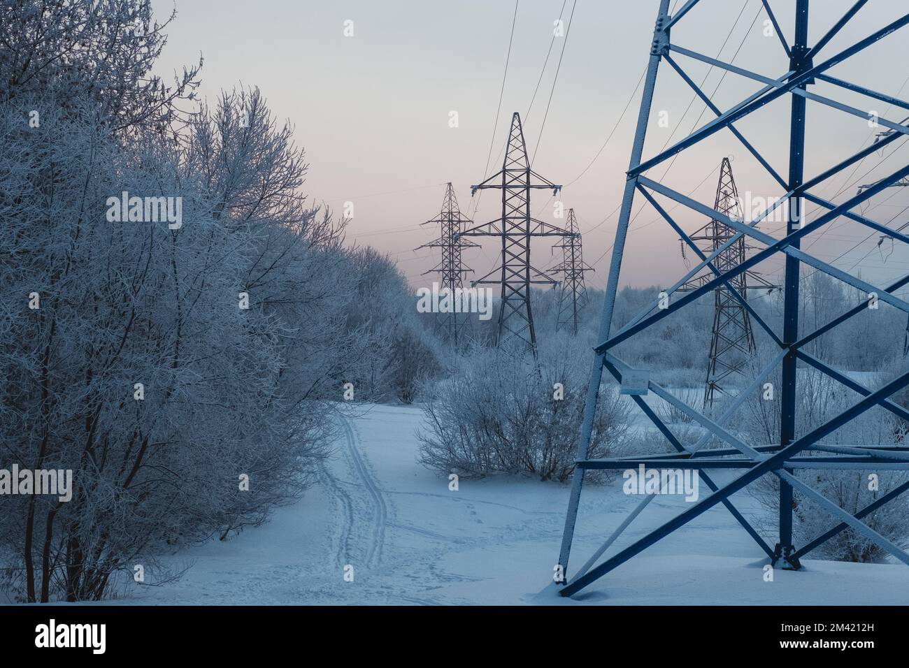 Winter, snowfall. Power lines in the snow. High quality photo Stock ...