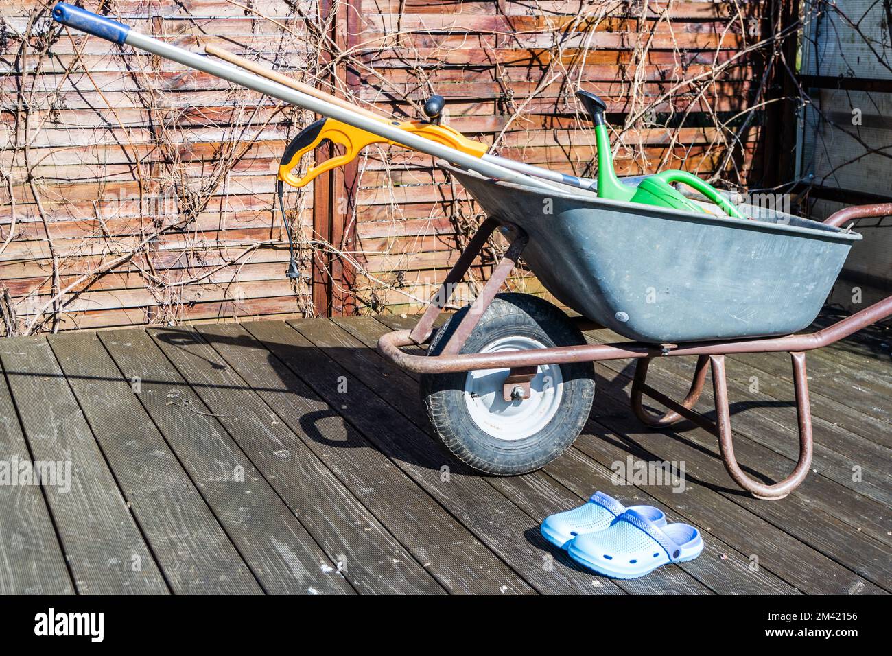 Garden tools in a wheelbarrow 03 Stock Photo - Alamy