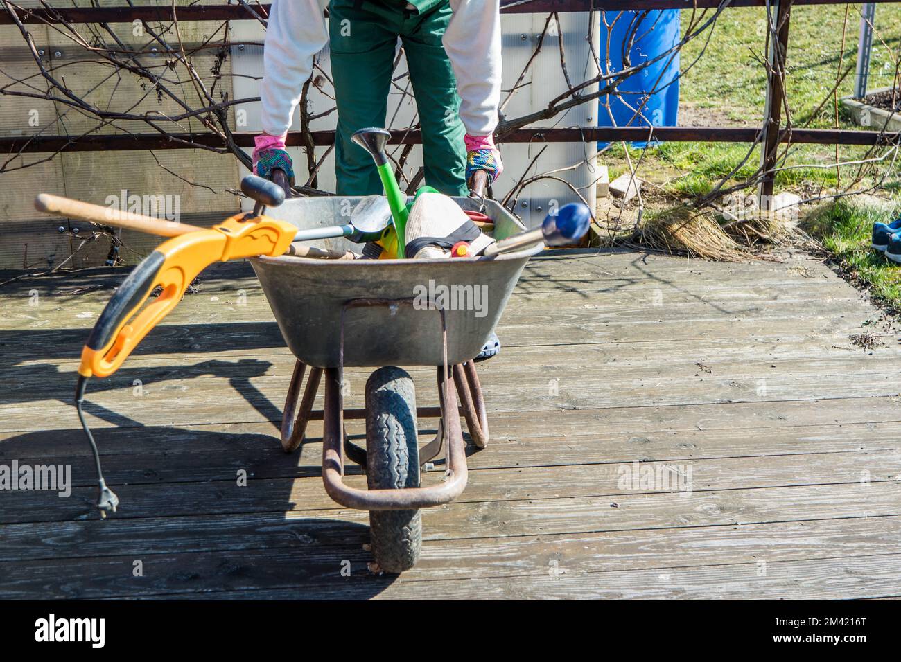 Garden tools in a wheelbarrow 08 Stock Photo - Alamy